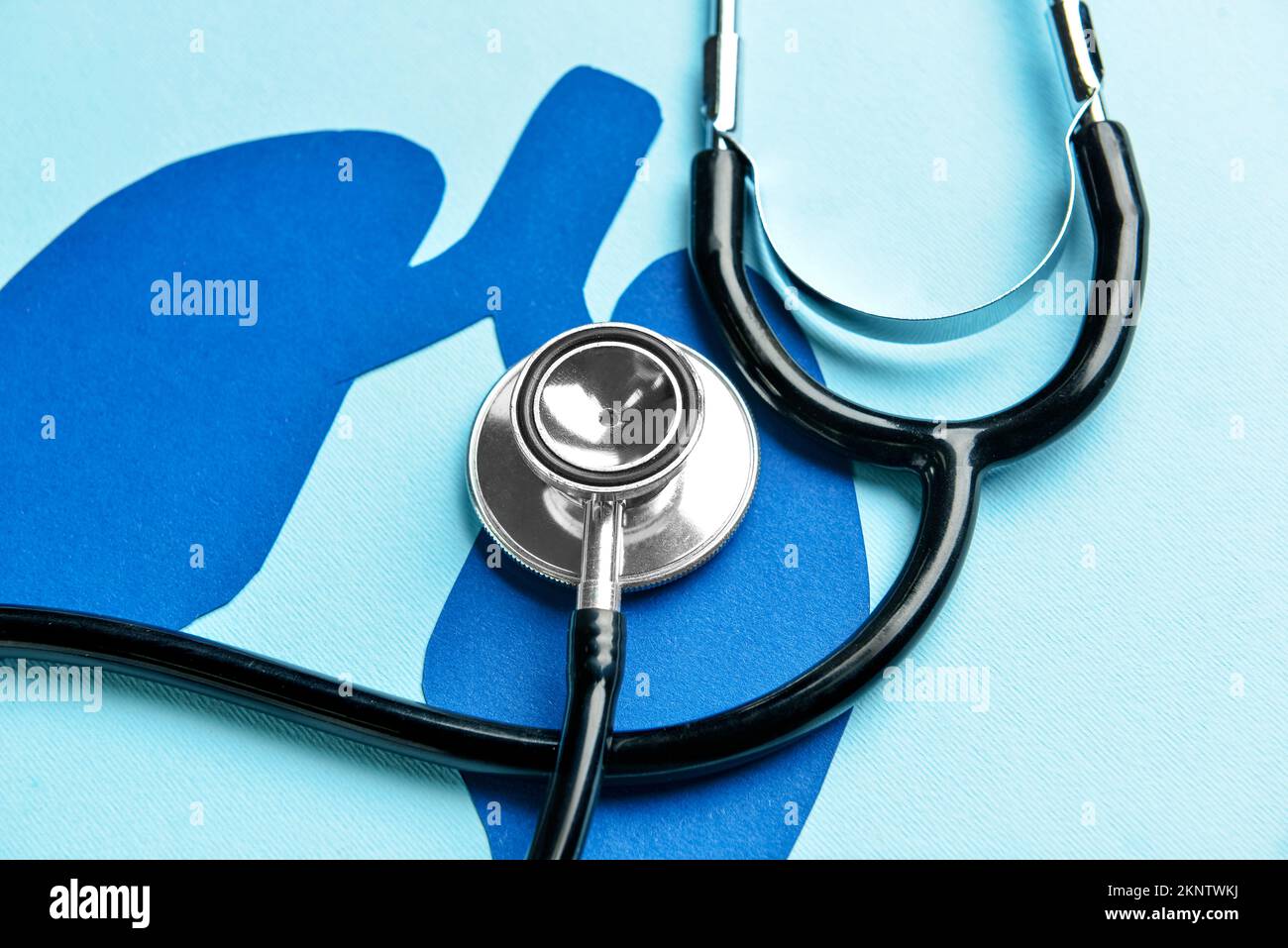 Paper lungs with stethoscope on blue background, closeup Stock Photo ...