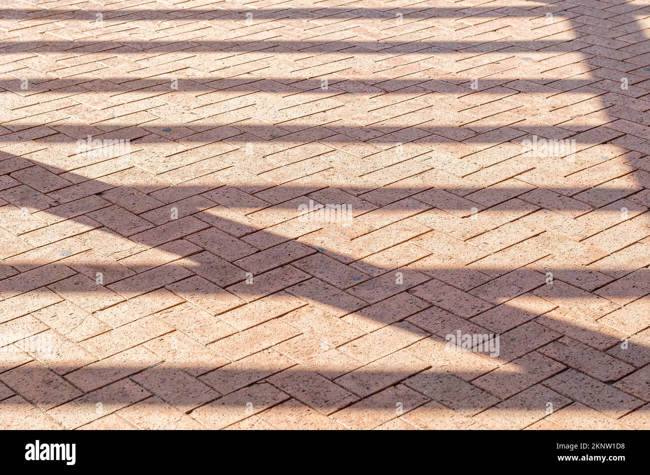 Pattern of shadows on the pavement, abstract background Stock Photo - Alamy
