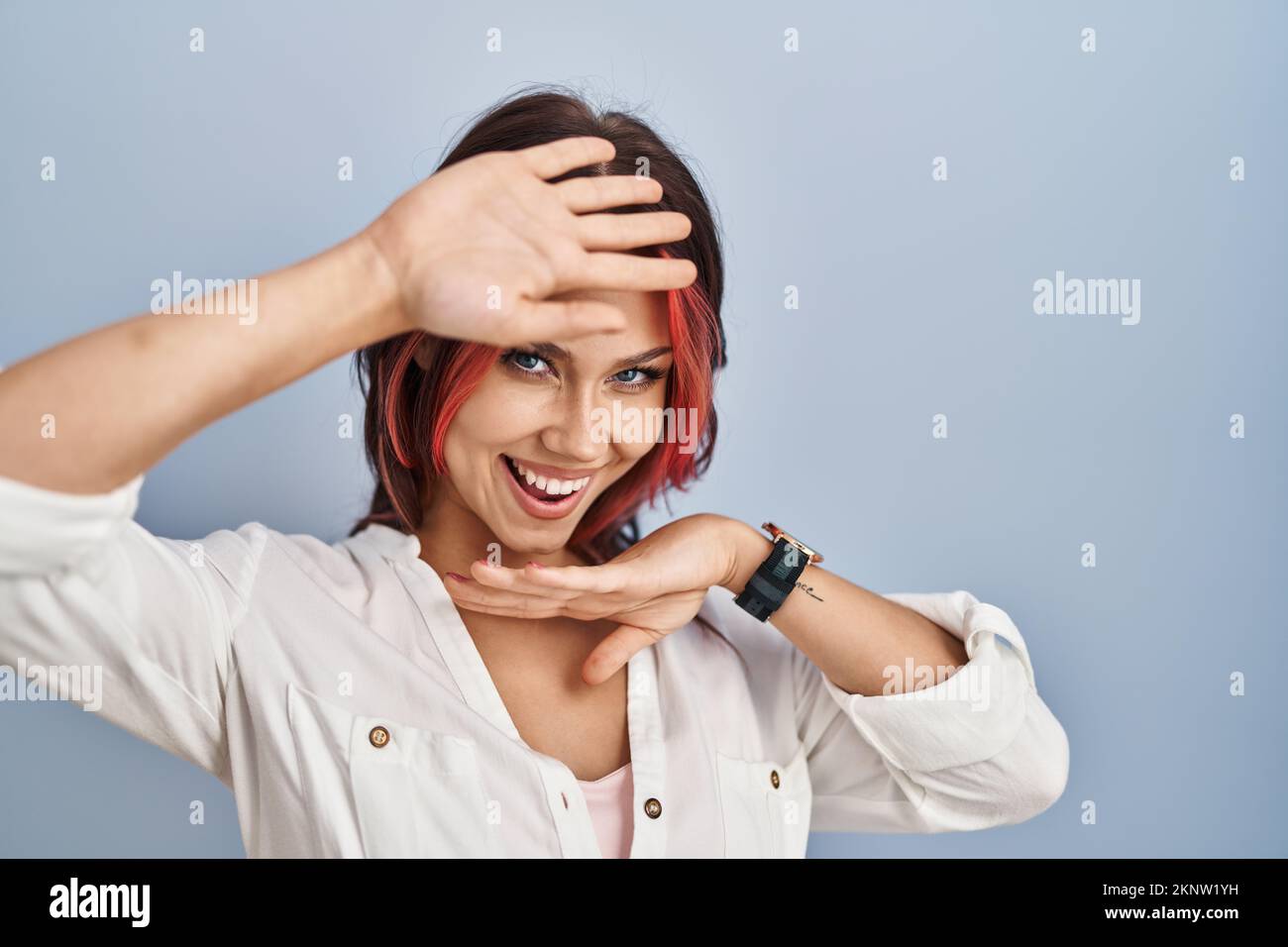 Young caucasian woman wearing casual white shirt over isolated ...