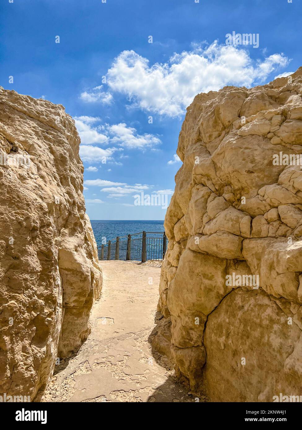 Pathway to observation deck between big stones Stock Photo - Alamy