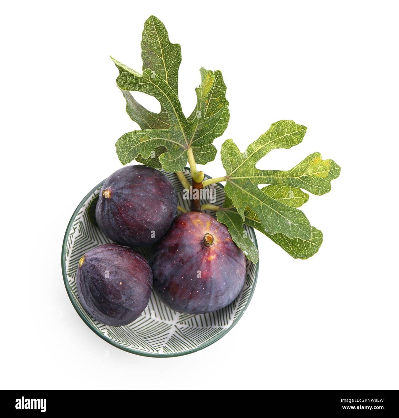 Bowl of fresh ripe figs and leaves on white background Stock Photo - Alamy