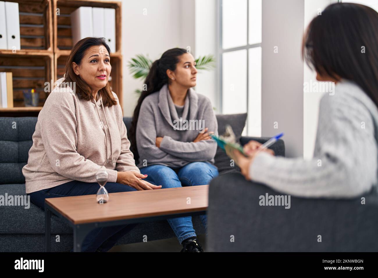 Three woman mother and daughter having psychology therapy at psychology ...