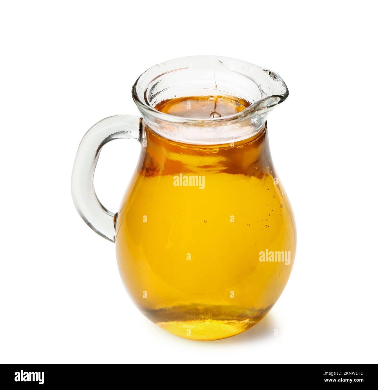Jug of fresh apple juice on white background Stock Photo - Alamy