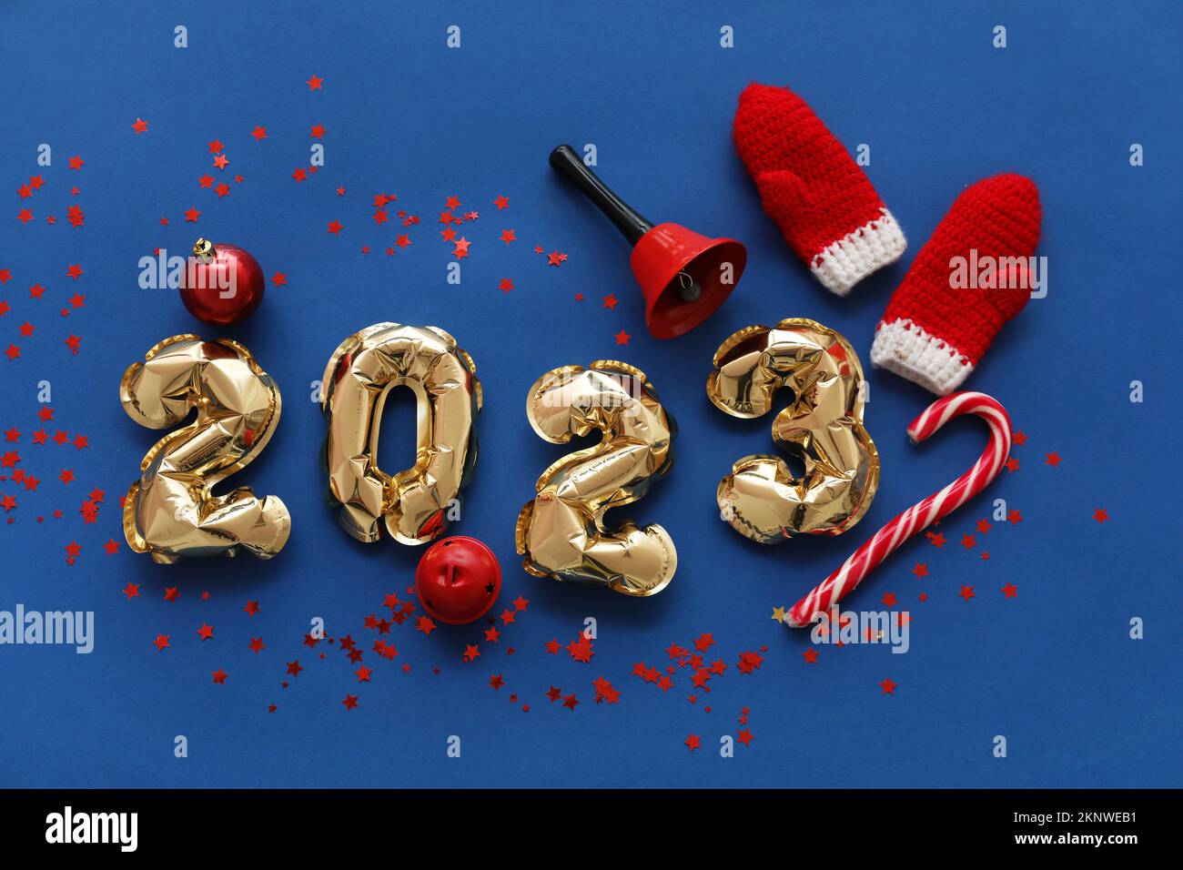 Figure 2023 made of balloons, Christmas decorations, gloves and ...