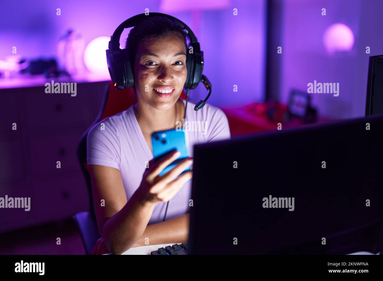 Attractive young hispanic woman streamer hi-res stock photography and ...