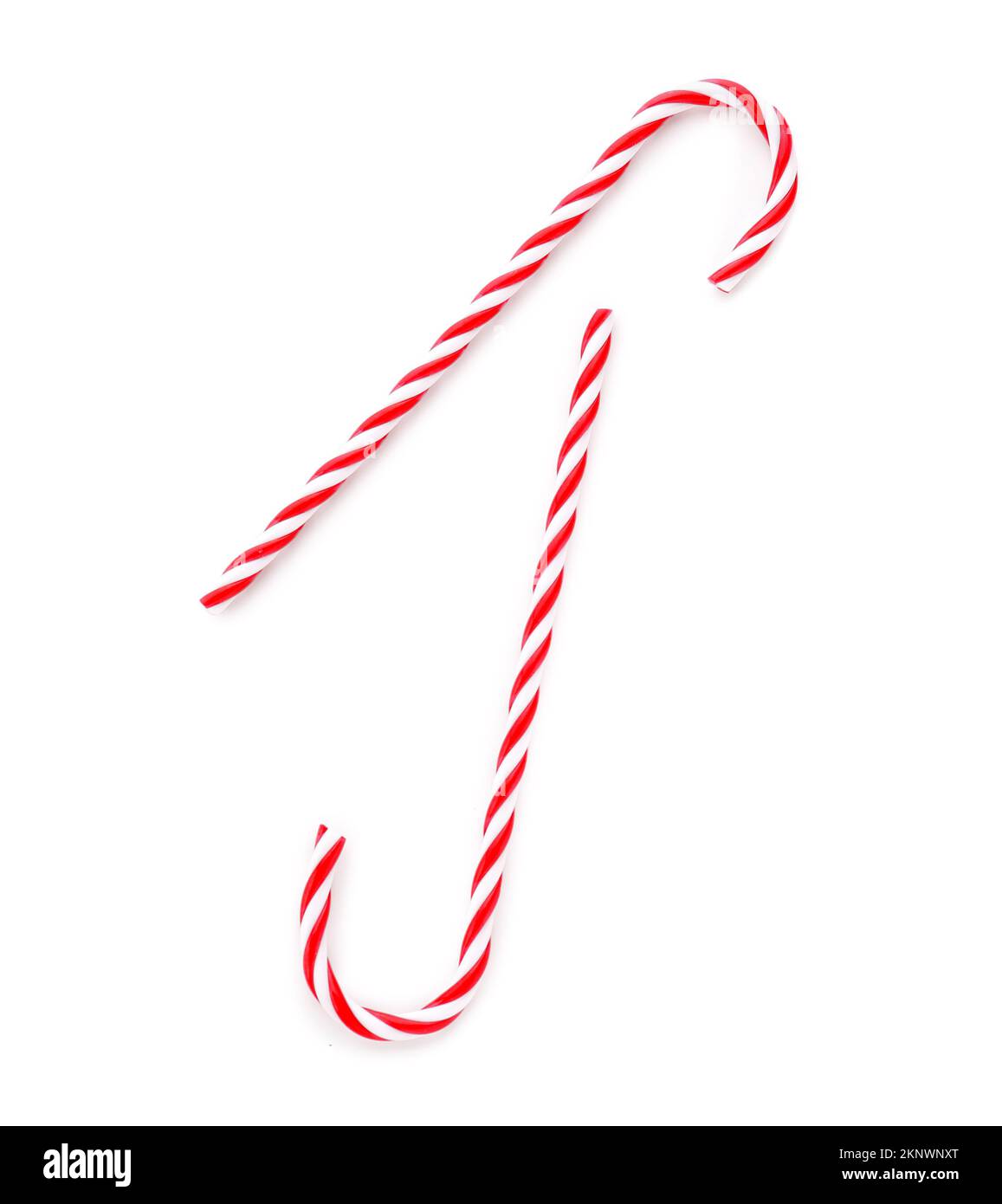 Sweet candy canes isolated on white background Stock Photo - Alamy