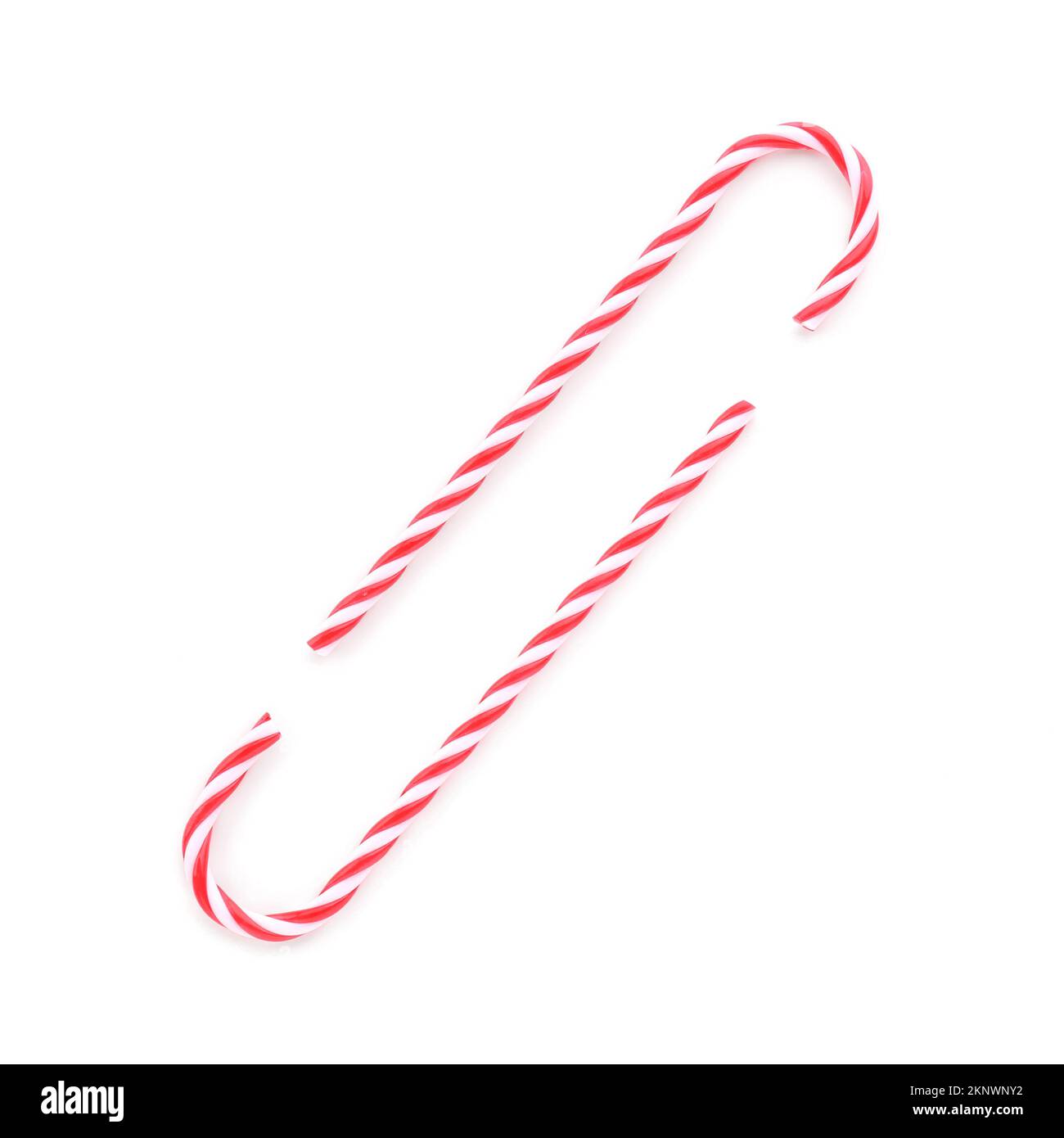 Sweet candy canes isolated on white background Stock Photo - Alamy