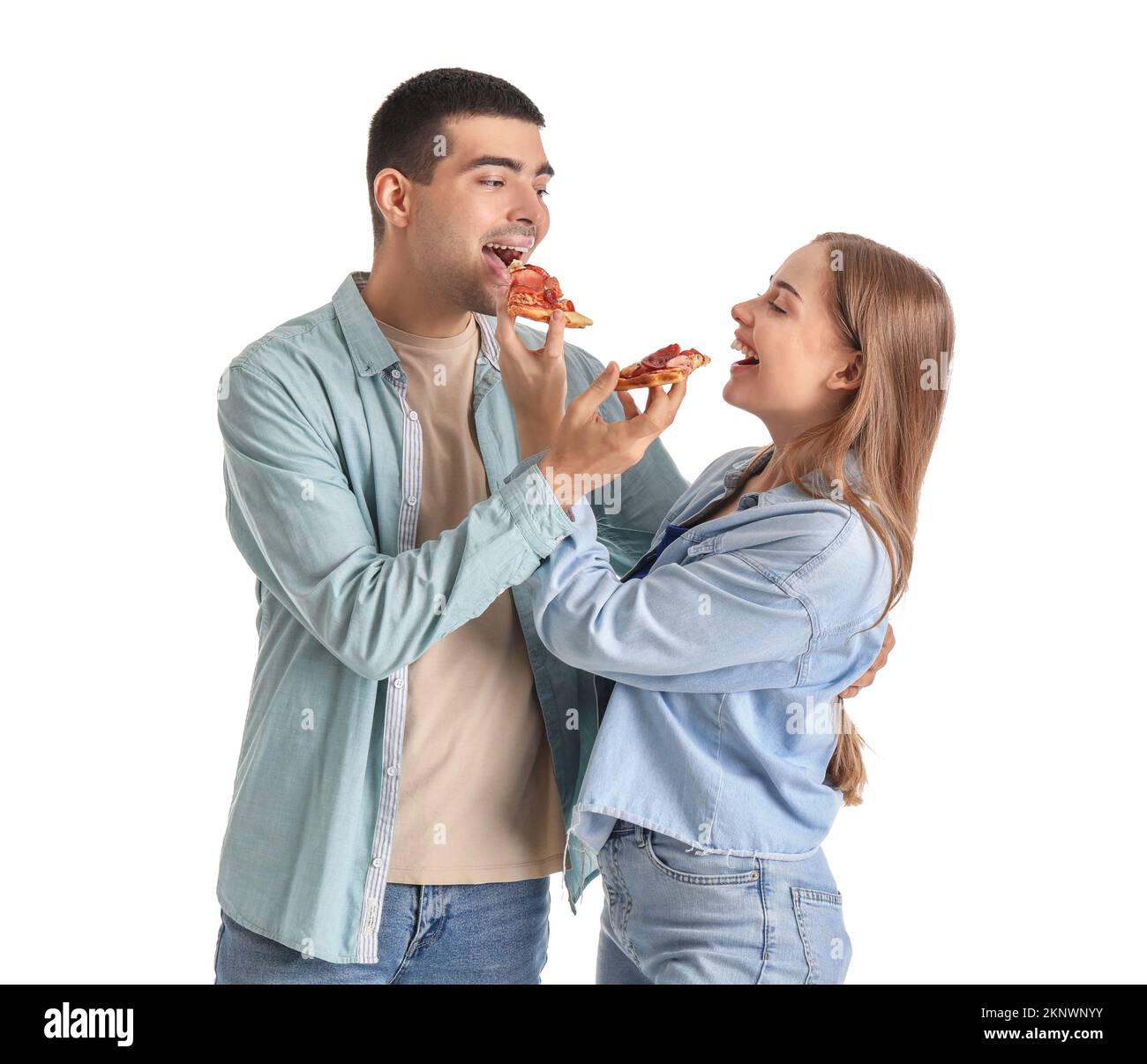 Romantic young woman feeding boyfriend Cut Out Stock Images & Pictures ...