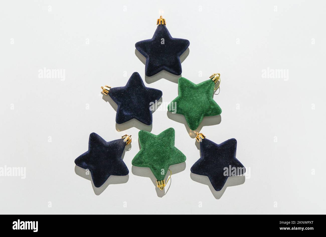 Christmas tree made of stars on grey background, top view Stock Photo ...
