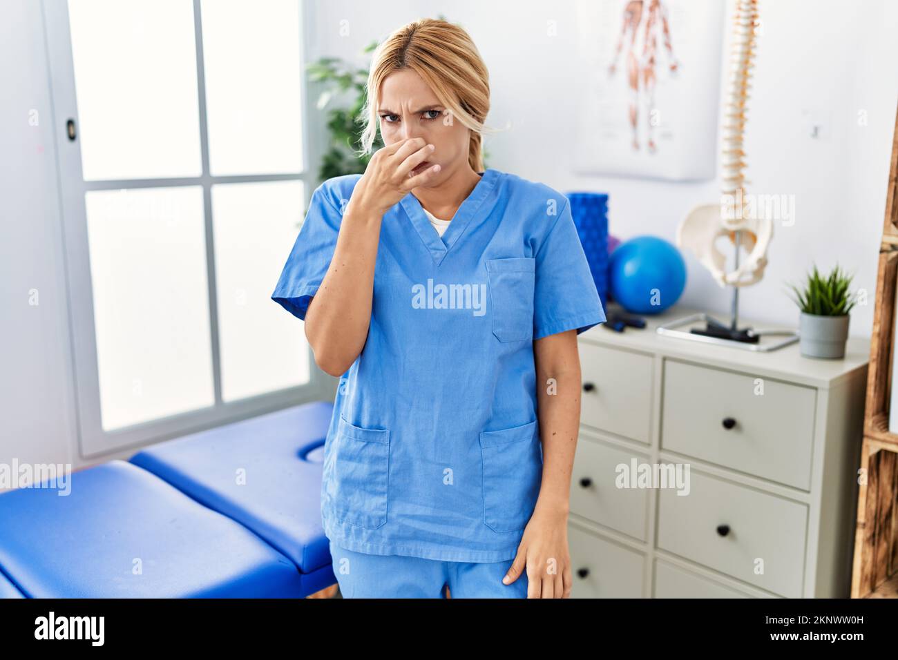Young doctor woman smelling hi-res stock photography and images - Alamy