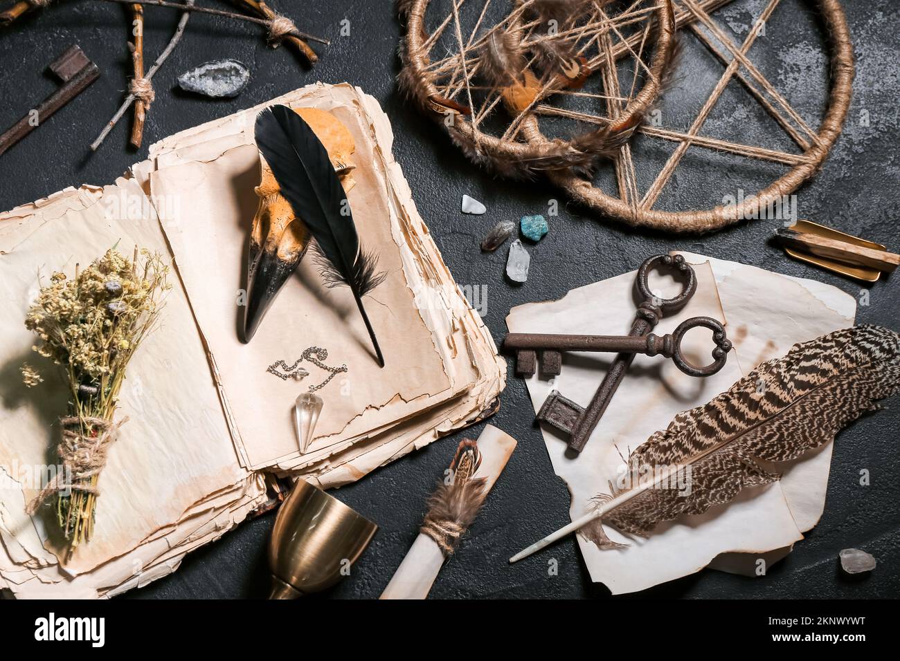 Magic attributes on dark table, top view Stock Photo - Alamy