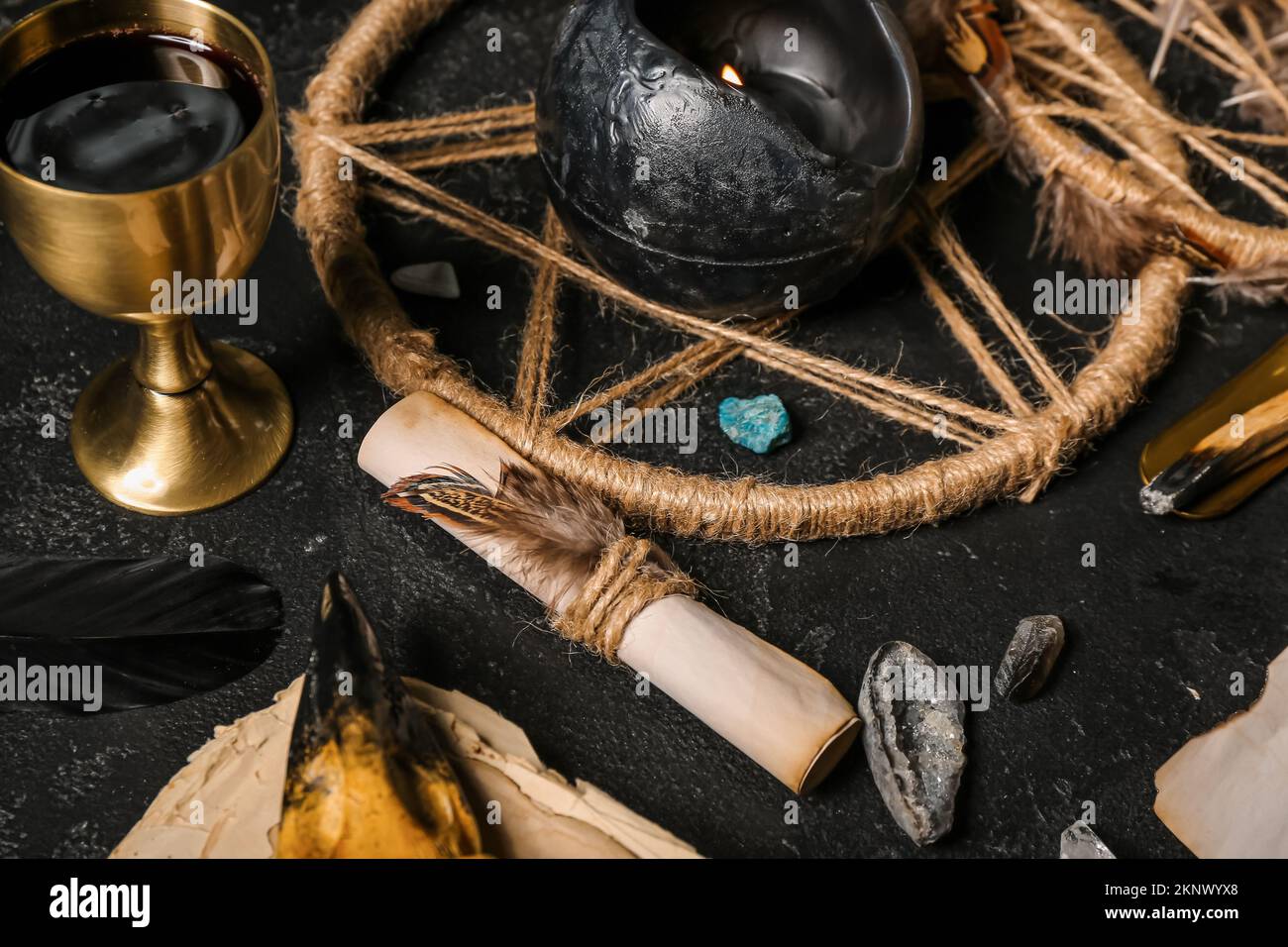 Magic attributes on dark table Stock Photo - Alamy