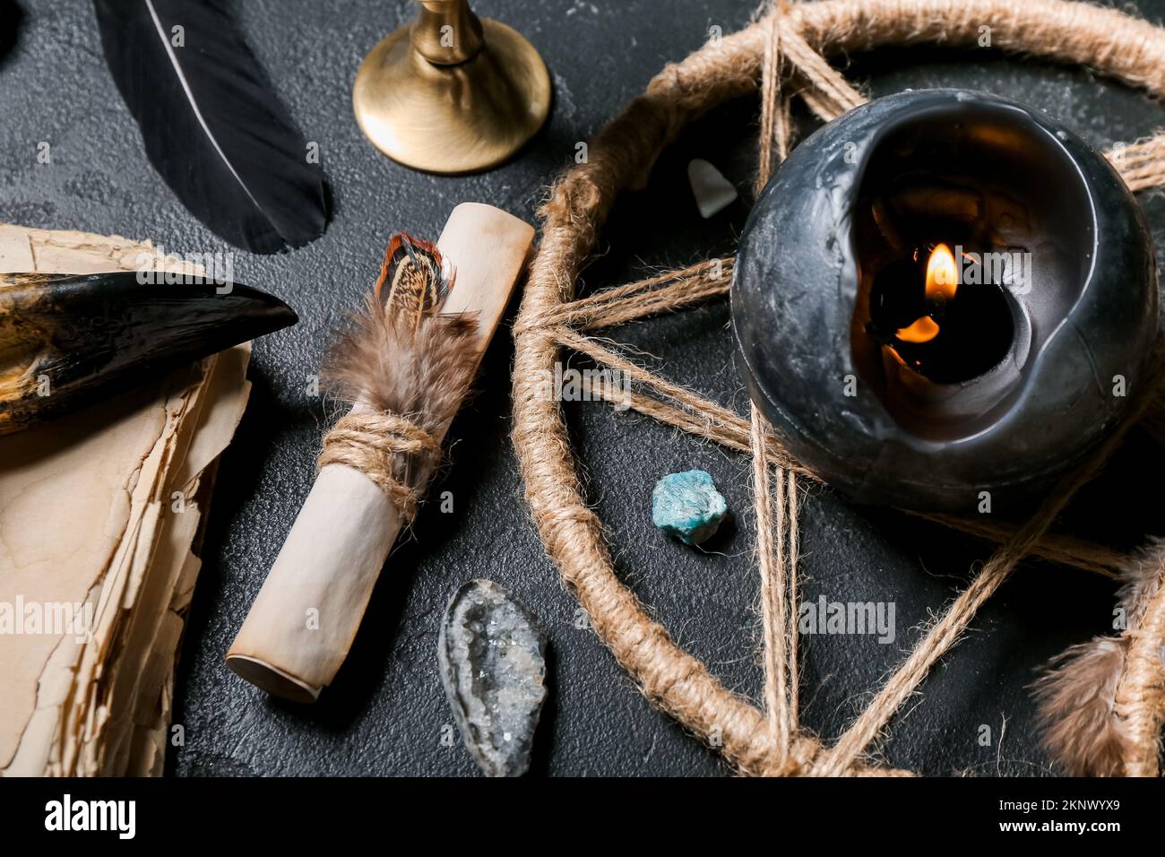Magic attributes on dark table Stock Photo - Alamy