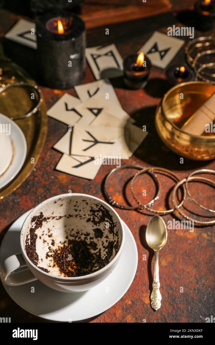 Magic attributes of fortune teller on table Stock Photo - Alamy