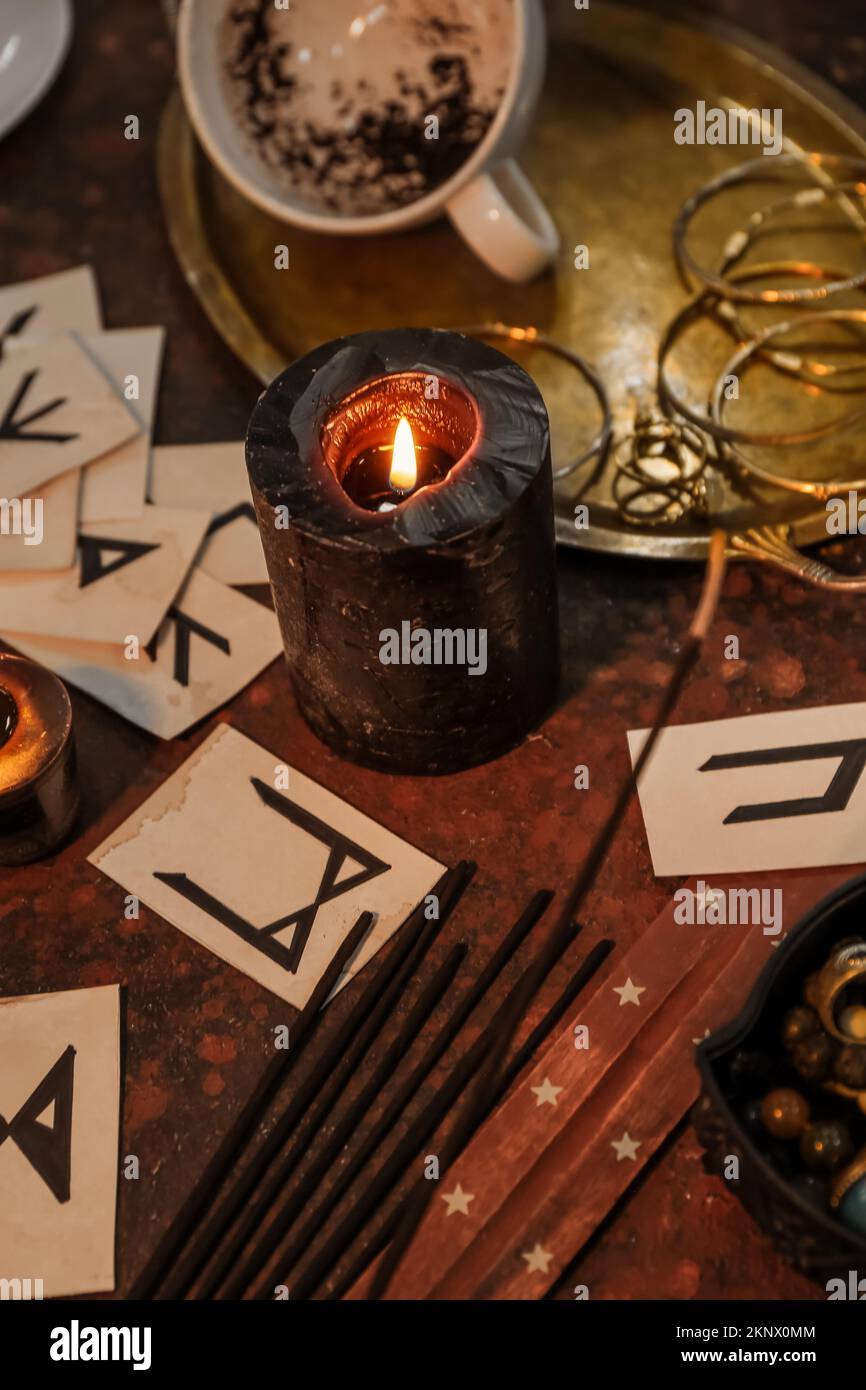 Magic attributes of fortune teller on table Stock Photo - Alamy