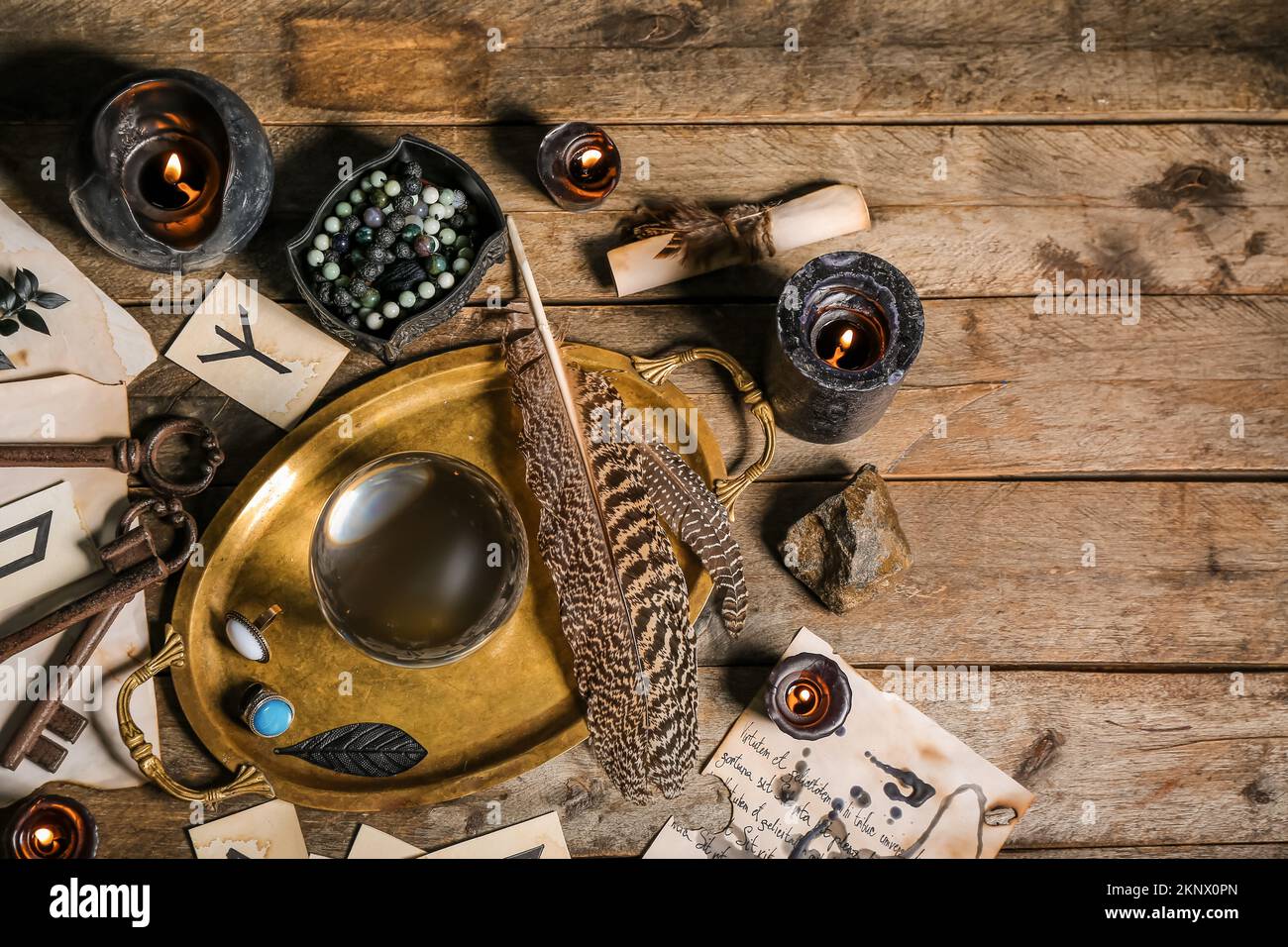 Magic attributes of soothsayer on wooden table, top view Stock Photo ...