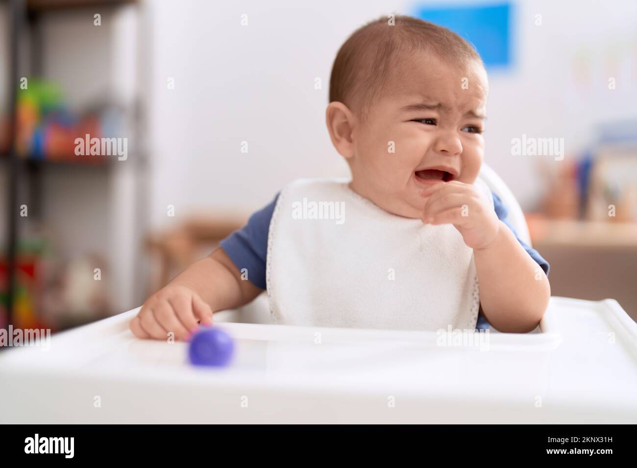 Baby highchair crying hi-res stock photography and images - Alamy