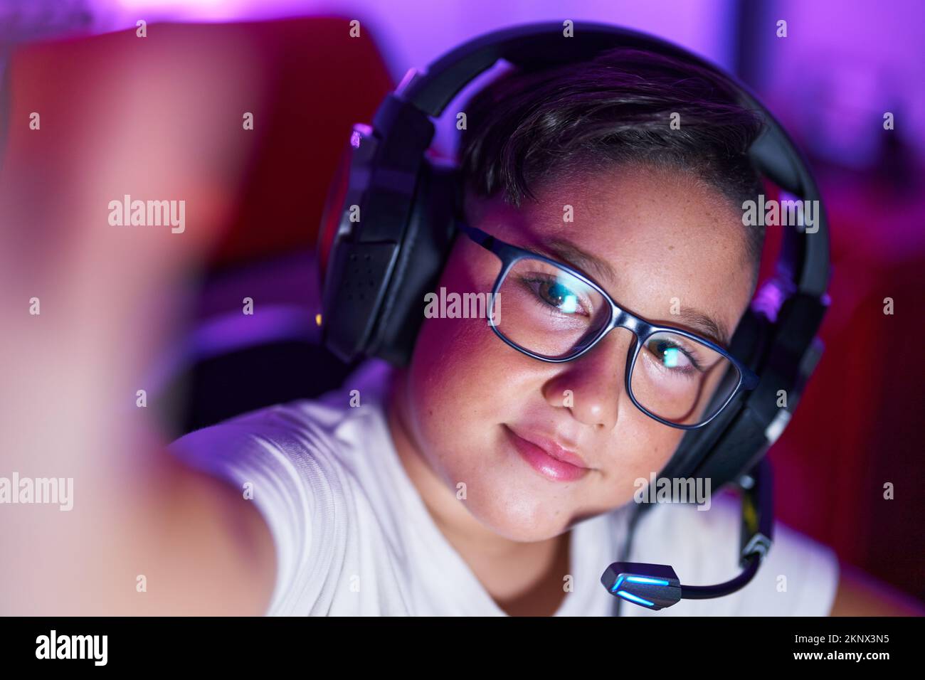 Adorable hispanic boy streamer smiling confident make selfie by camera ...