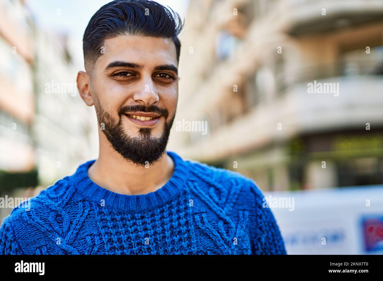Young arab man smiling confident at street Stock Photo - Alamy