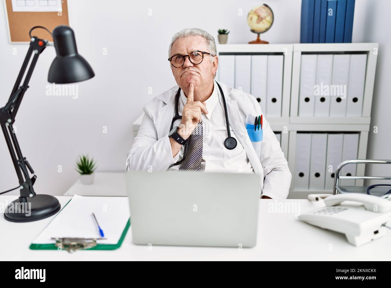 Reflective thinking nurse hi-res stock photography and images - Alamy