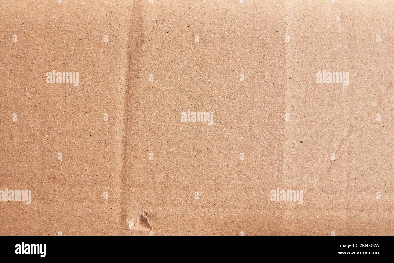 Brown cardboard carton material texture background Stock Photo - Alamy