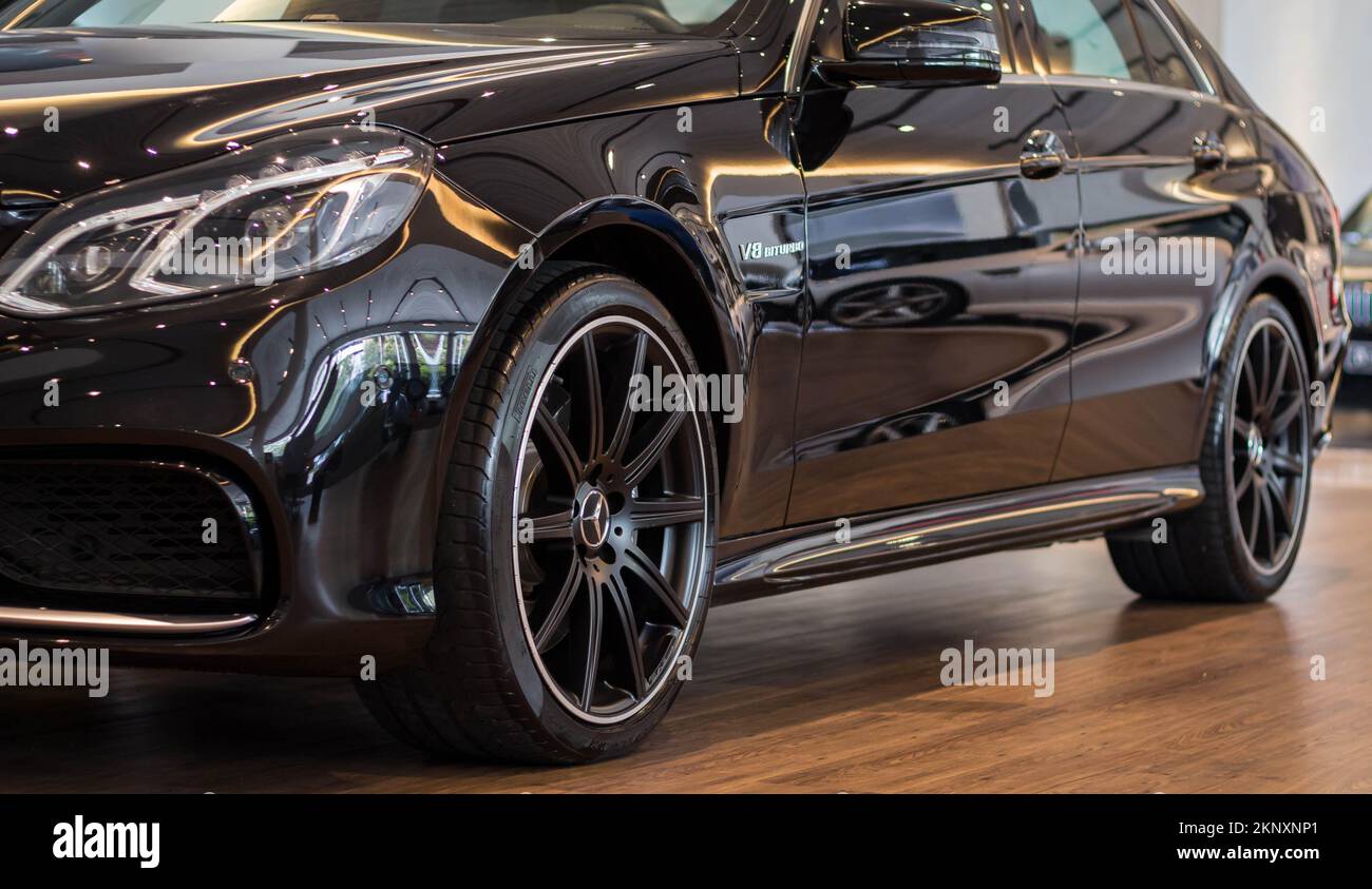 A black Mercedes Benz E63 AMG from the side Stock Photo - Alamy