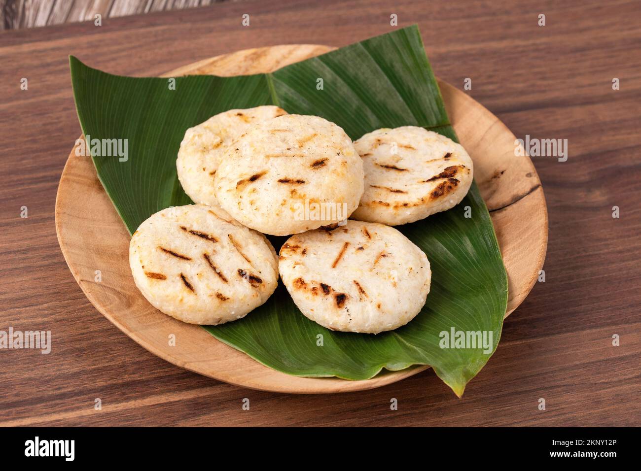Small and round arepas - traditional Colombian food Stock Photo - Alamy