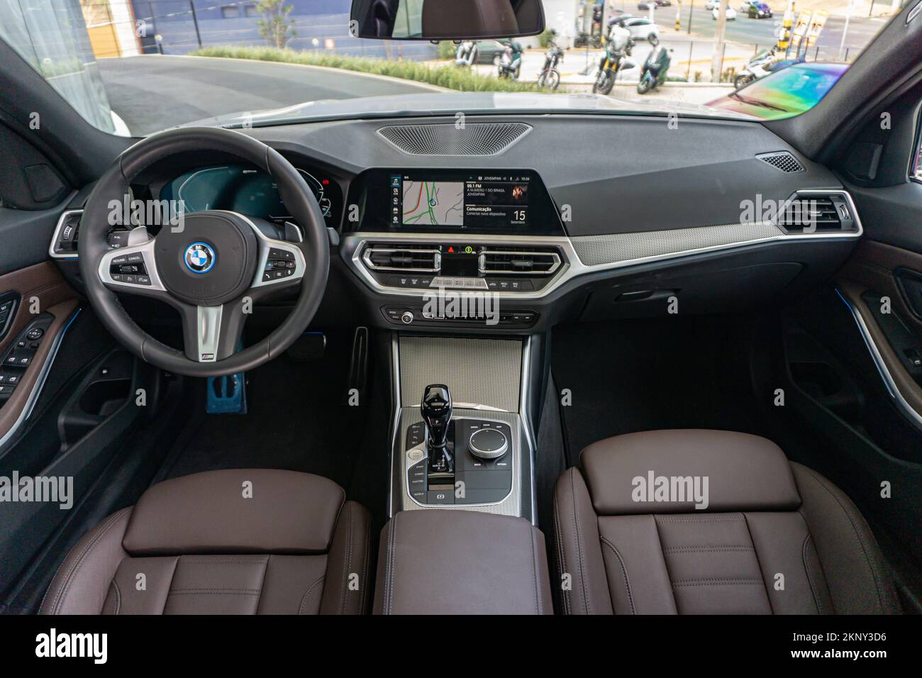 The interior of a BMW 320i 2021 in dark brown leather and tetragon ...
