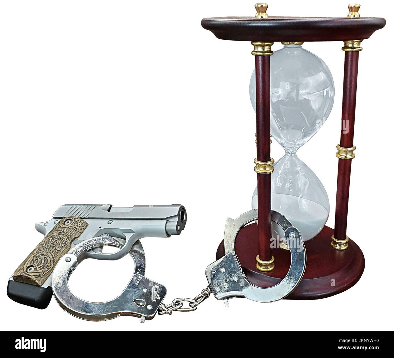 Gun and hourglass handcuffed together to show doing time Stock Photo ...