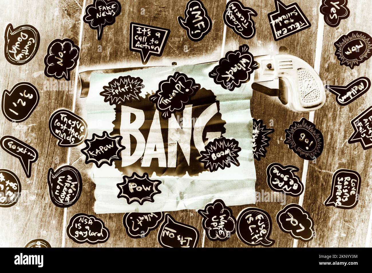 A comic con fake shooting scene with pop art gun and media circus ...