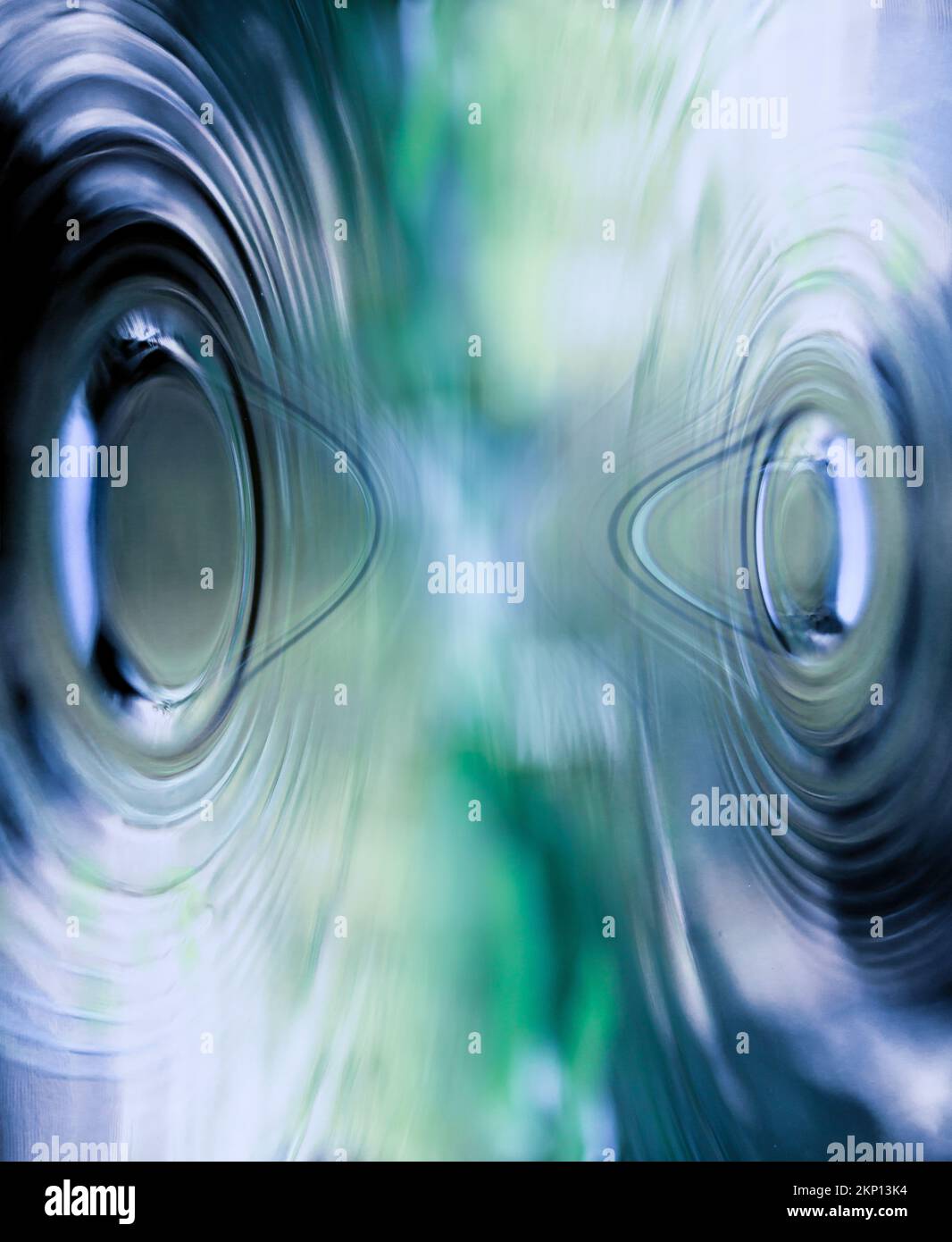 A mirror reflection of a blue swirl Stock Photo - Alamy