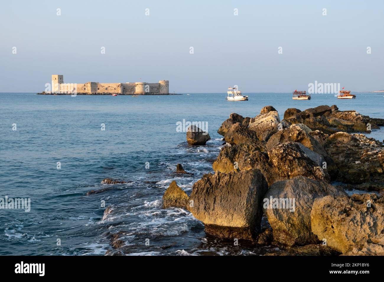 Kizkalesi or Maiden Castle near Mersin on a small island at sunrise ...