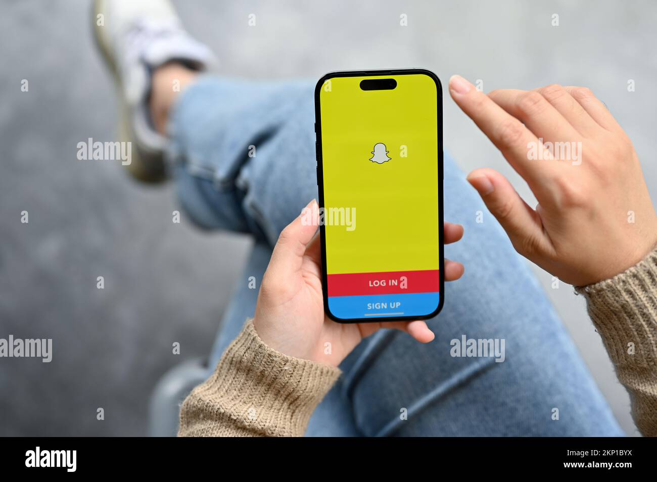 Chiang Mai, Thailand - Nov 25 2022: A female hand holding a smartphone ...