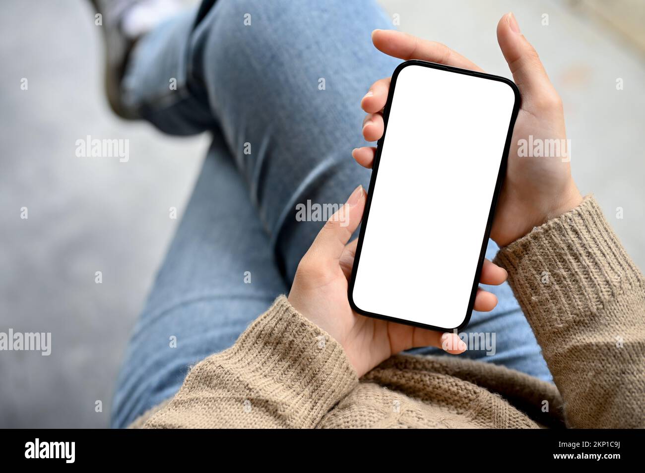 Top view, A female using her smartphone while relaxes sitting in the ...