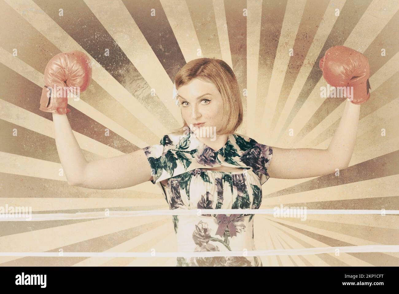 Vintage portrait of a tough boxer girl wearing gloves when flexing ...