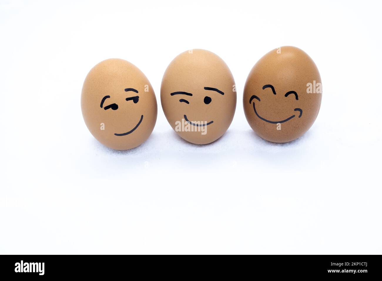 Two eggs flirting and one very happy 1 Stock Photo - Alamy