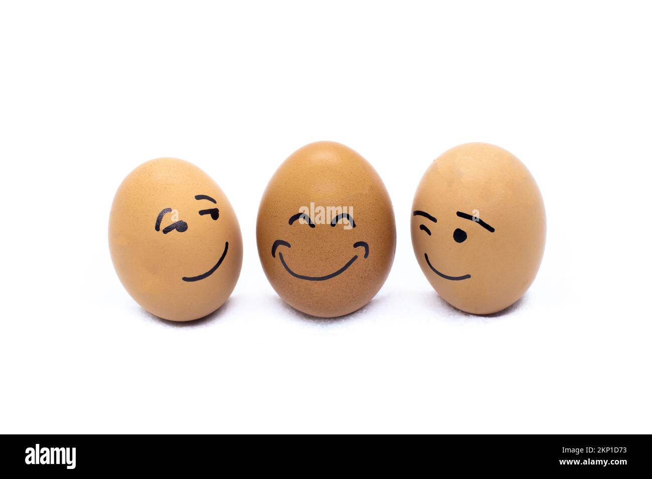 Two eggs flirting and one very happy Stock Photo - Alamy
