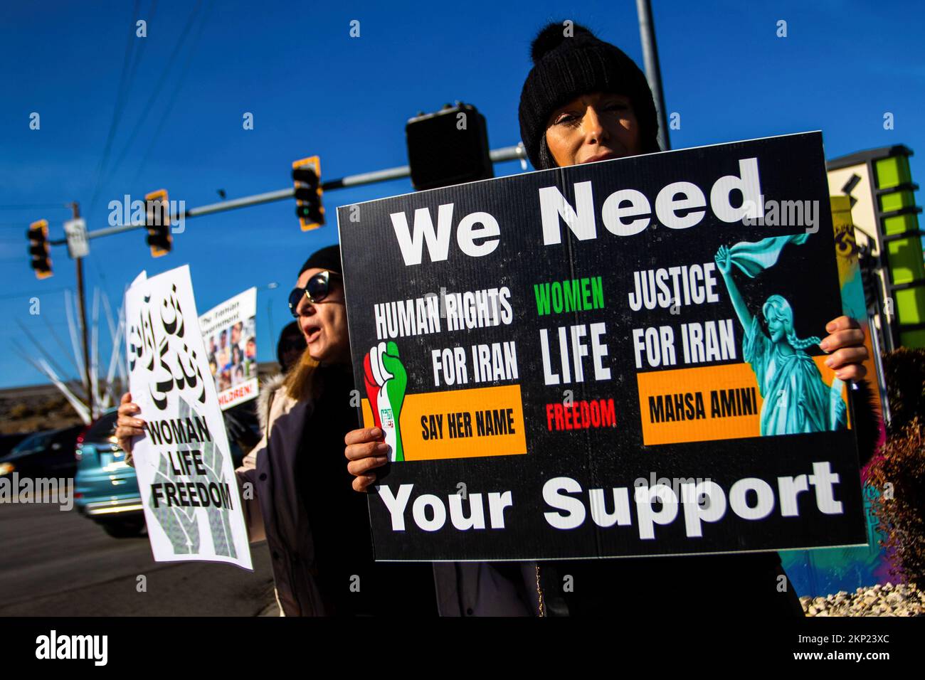 Protesters hold placards expressing their opinion during the ...