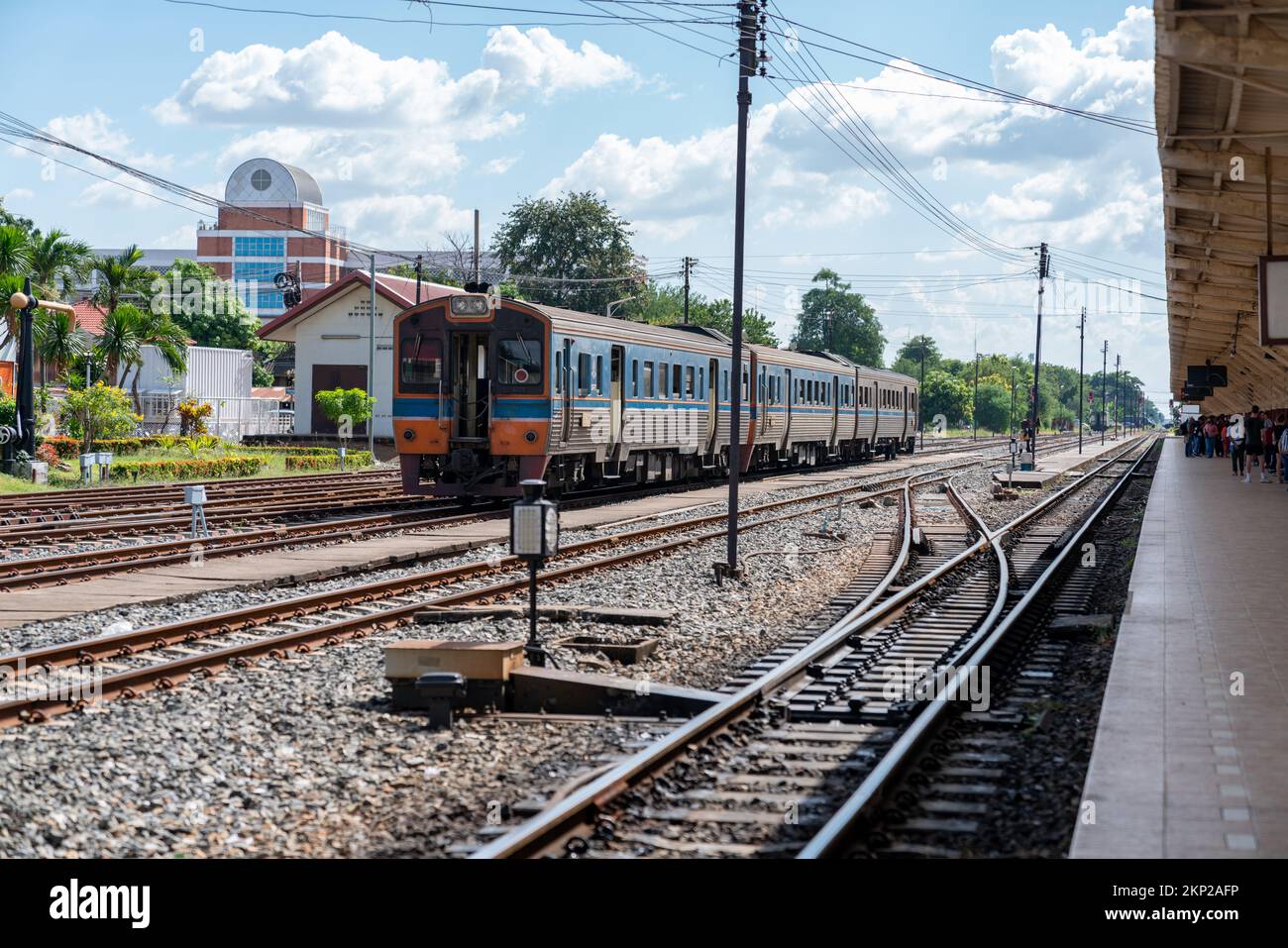 Train on the railway station at local station to drive out station in ...