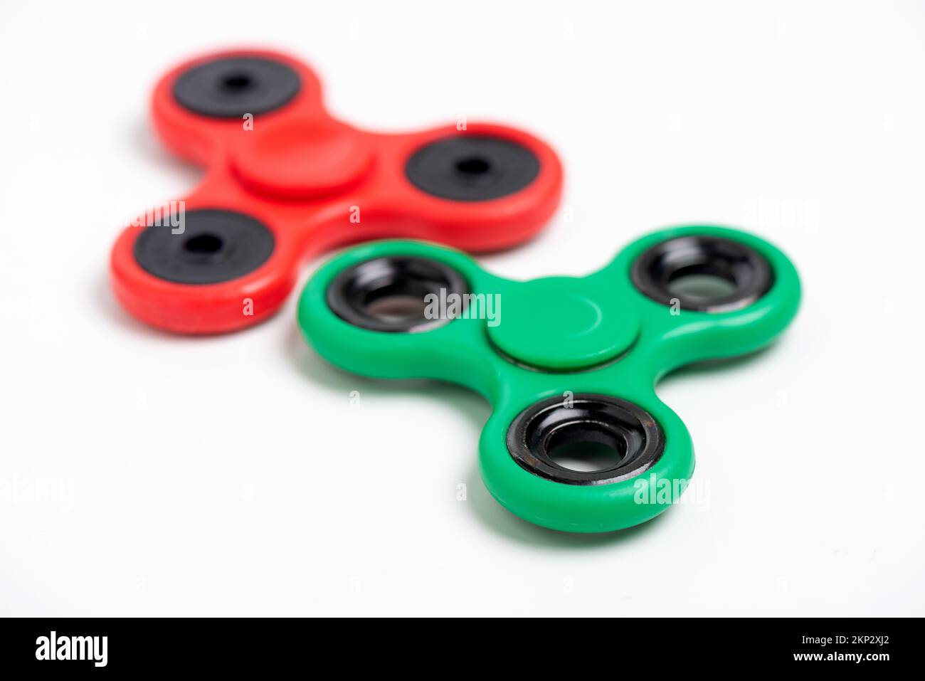 Plastic fidget spinner toy, stress and anxiety relieving toy Stock ...