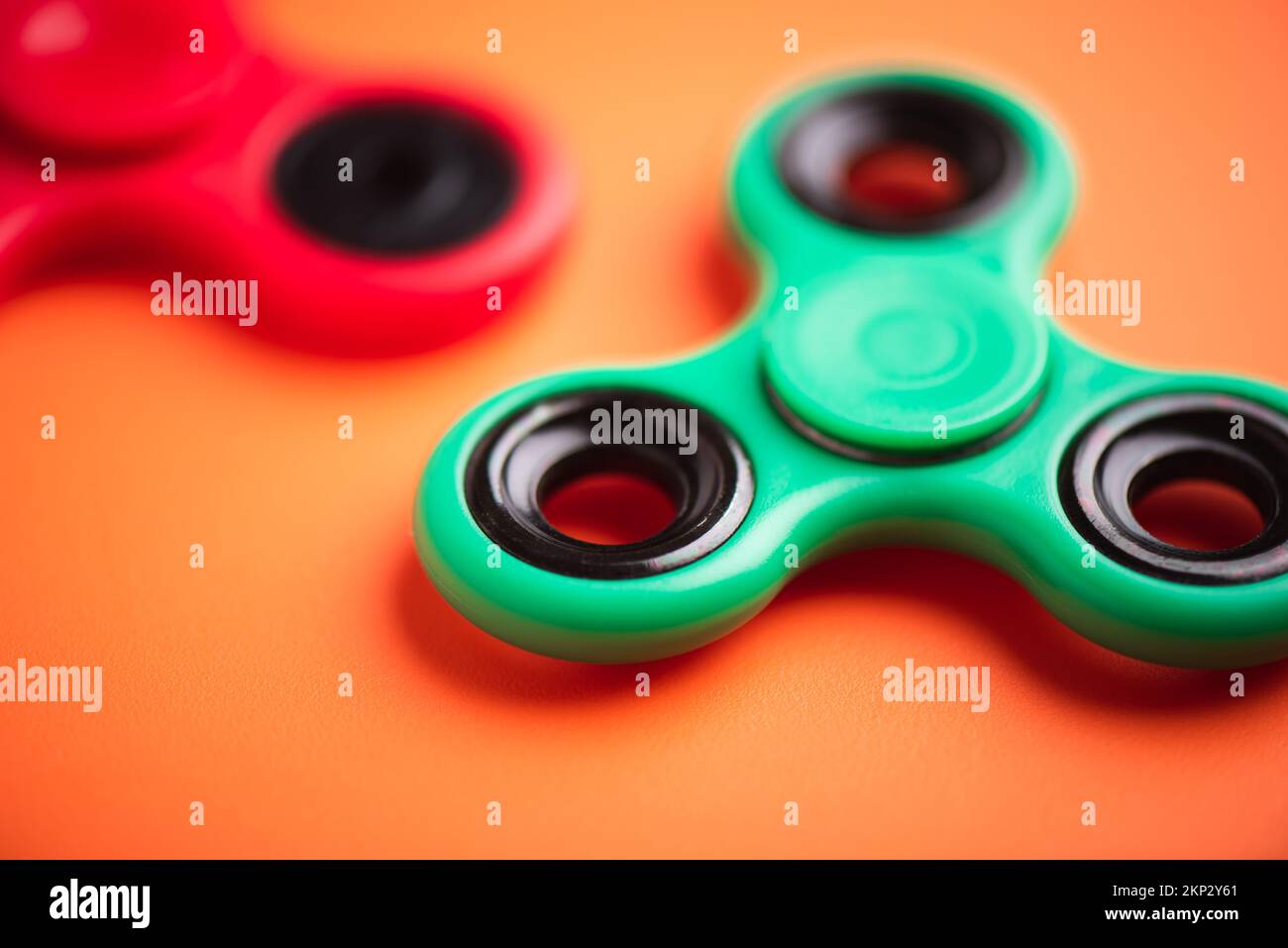 Plastic fidget spinner toy, stress and anxiety relieving toy Stock ...