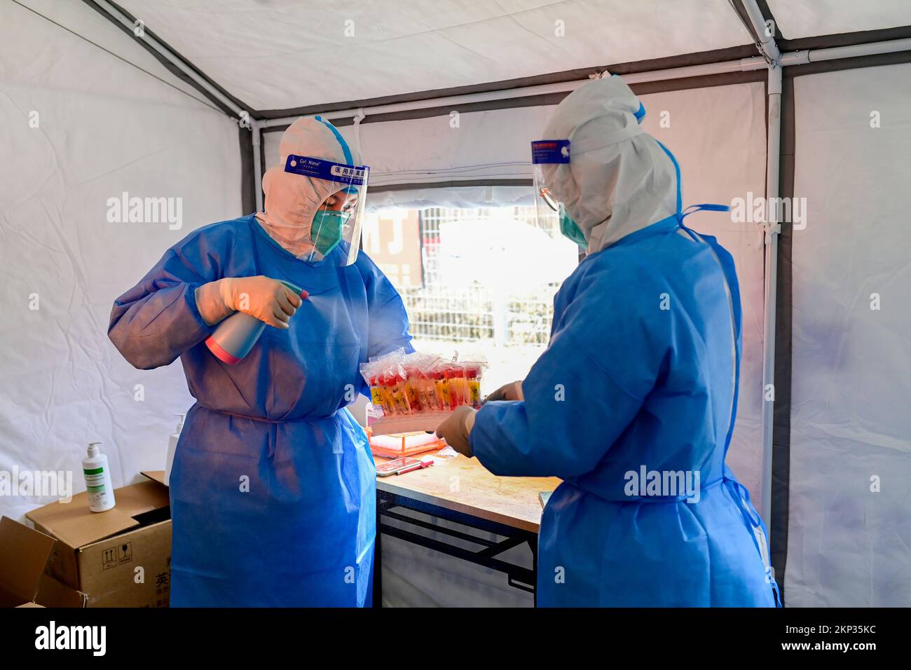 HOHHOT, CHINA - NOVEMBER 28, 2022 - Medical workers disinfect nucleic ...