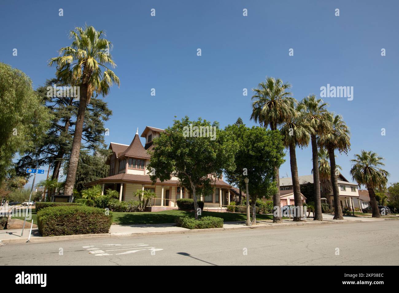 Palm tree framed view of historic downtown Colton, California, USA ...