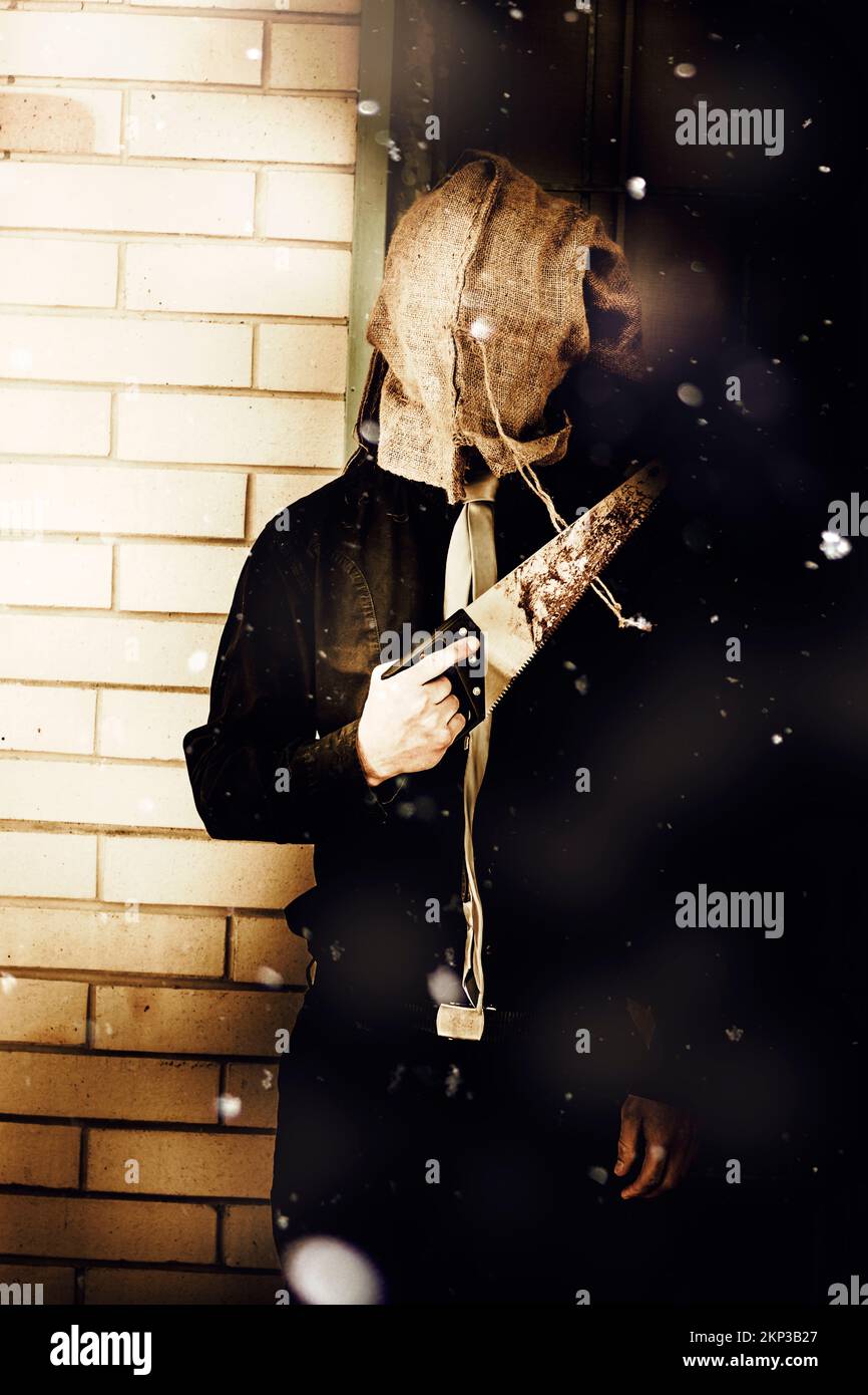 Dramatic scary portrait of an unrecognisable angry man standing in the ...