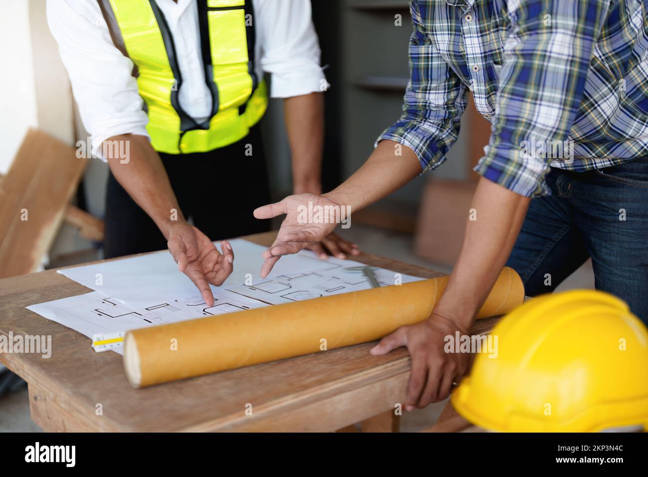 Professional Architect Designer Structural Engineer Team Colleagues Discussing Building Plan