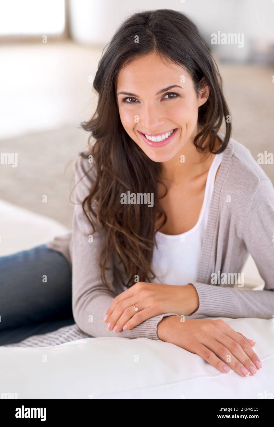 Looking forward to a relaxing weekend. a gorgeous young woman on a ...