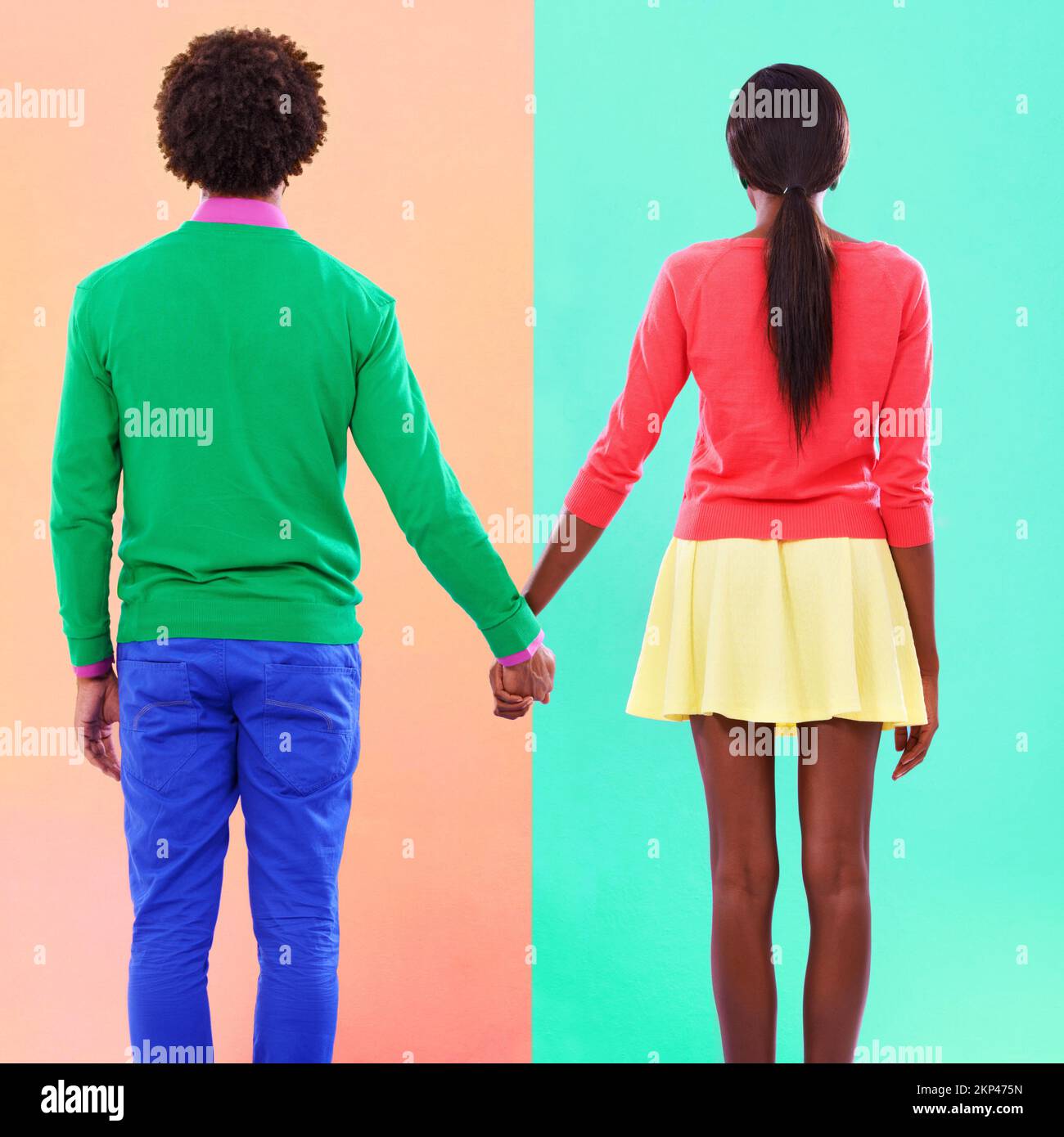 Love in all the colors of a rainbow. Rearview shot of a young couple ...