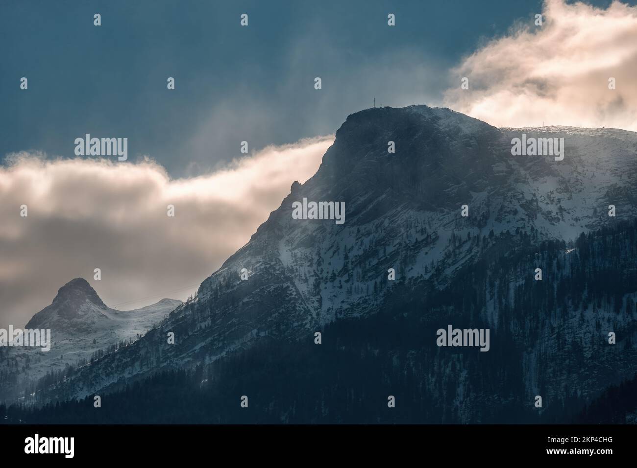 A landscape of Snowy Mountains Alps with cloudy sky in Hallstatt ...