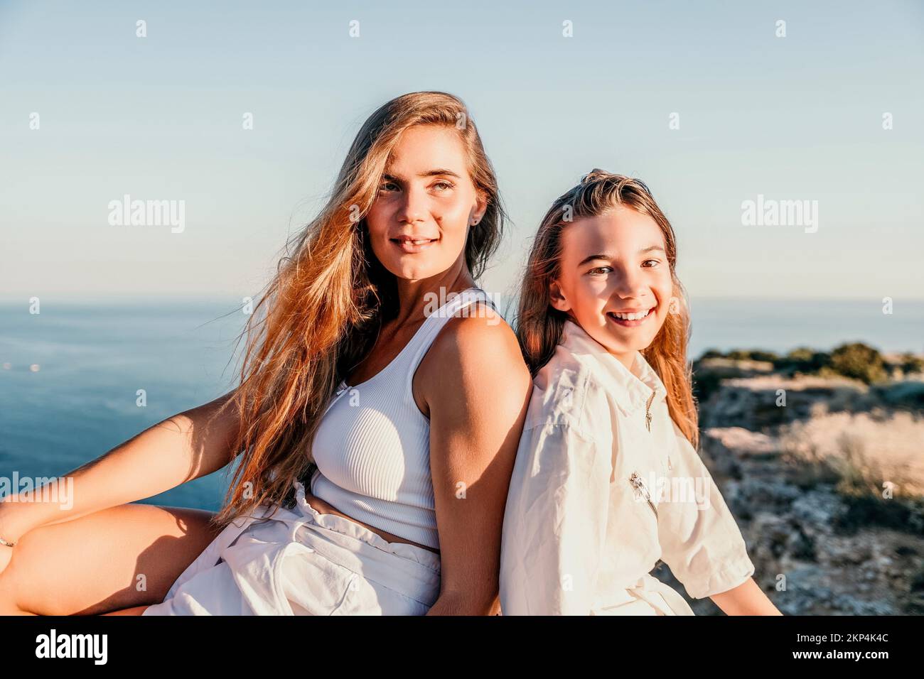 Sea family vacation together, happy mom and teenage daughter hugging ...