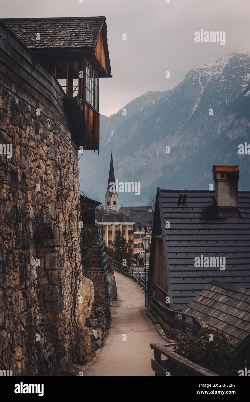 Wooden traditional chalets roofs in Hallstatt street in Austria with ...
